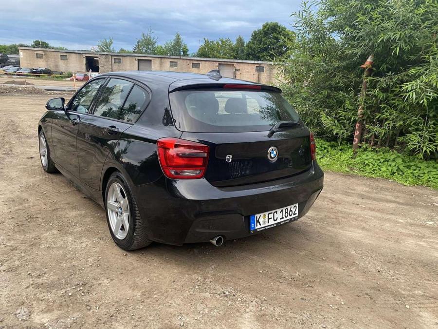 Black BMW 116 2013 in Kaunas, with an engine capacity of 1.60 L and mileage of 200 thousand km for 4800 €, photo 3 on AUTOMOTO.COM.LV