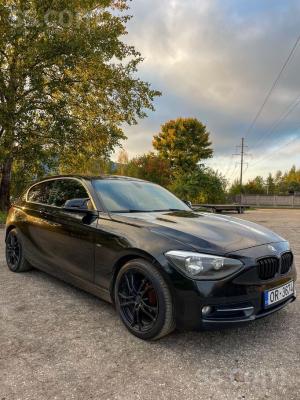 Black BMW 116 2013 in Ogre, with an engine capacity of 1.60 L and mileage of 337 thousand km for 4490 €, photo  on AUTOMOTO.COM.LV