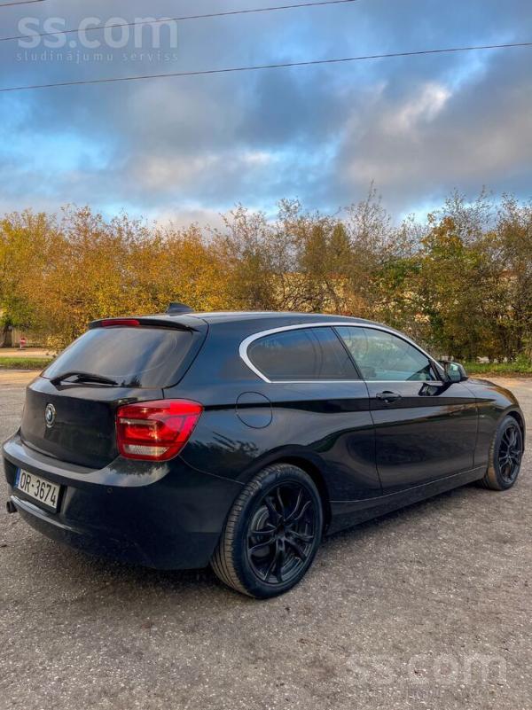 Black BMW 116 2013 in Ogre, with an engine capacity of 1.60 L and mileage of 337 thousand km for 4190 €, photo 5 on AUTOMOTO.COM.LV