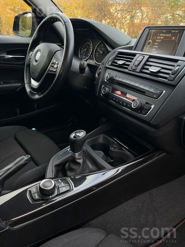 Black BMW 116 2013 in Ogre, with an engine capacity of 1.60 L and mileage of 337 thousand km for 4190 €, photo 7 on AUTOMOTO.COM.LV