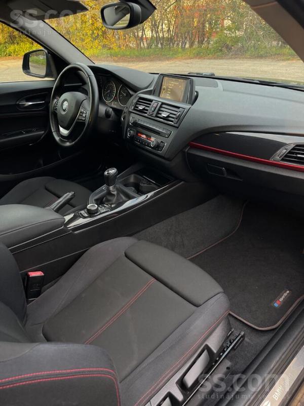 Black BMW 116 2013 in Ogre, with an engine capacity of 1.60 L and mileage of 337 thousand km for 4190 €, photo 8 on AUTOMOTO.COM.LV