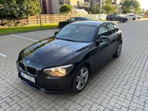 Black BMW 116 2013 in Riga, with an engine capacity of 1.60 L and mileage of 185 thousand km for 6100 €, photo  on AUTOMOTO.COM.LV