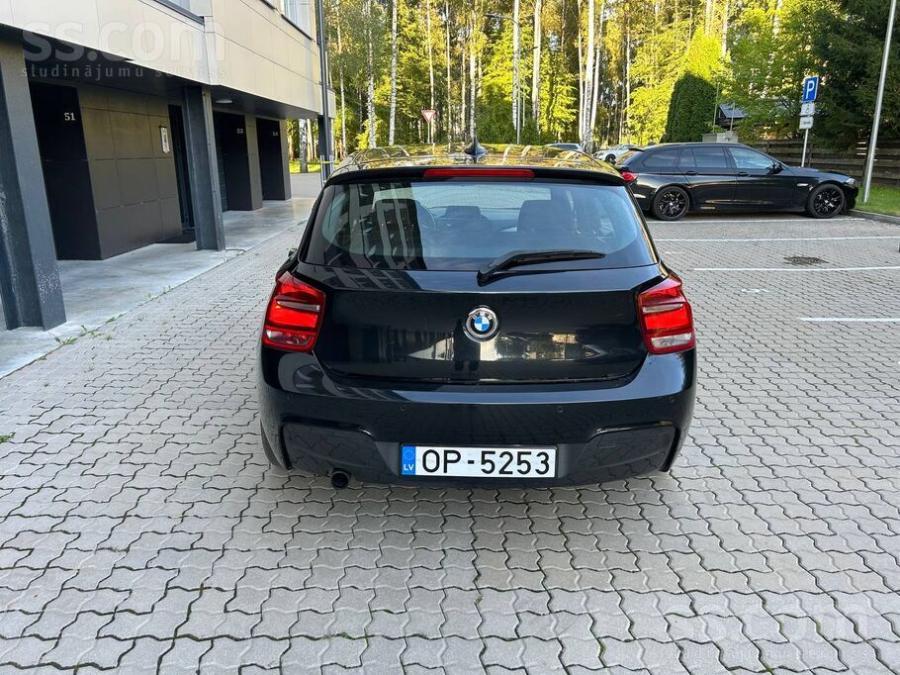 Black BMW 116 2013 in Riga, with an engine capacity of 1.60 L and mileage of 185 thousand km for 6100 €, photo 5 on AUTOMOTO.COM.LV