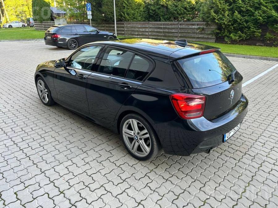 Black BMW 116 2013 in Riga, with an engine capacity of 1.60 L and mileage of 185 thousand km for 6100 €, photo 6 on AUTOMOTO.COM.LV