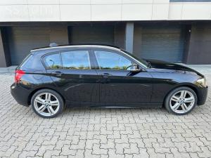 Black BMW 116 2013 in Riga, with an engine capacity of 1.60 L and mileage of 185 thousand km for 6100 €, photo 8 on AUTOMOTO.COM.LV