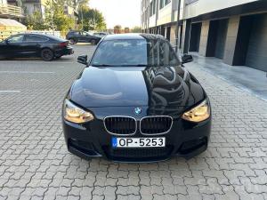 Black BMW 116 2013 in Riga, with an engine capacity of 1.60 L and mileage of 185 thousand km for 6100 €, photo 9 on AUTOMOTO.COM.LV