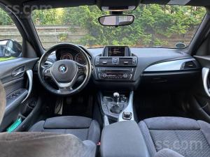 Black BMW 116 2013 in Riga, with an engine capacity of 1.60 L and mileage of 185 thousand km for 6100 €, photo 11 on AUTOMOTO.COM.LV