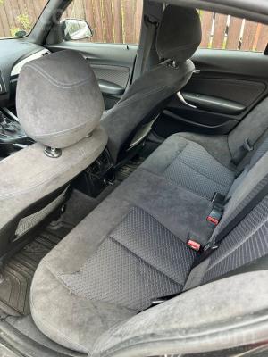 Black BMW 116 2013 in Riga, with an engine capacity of 1.60 L and mileage of 185 thousand km for 6100 €, photo 12 on AUTOMOTO.COM.LV