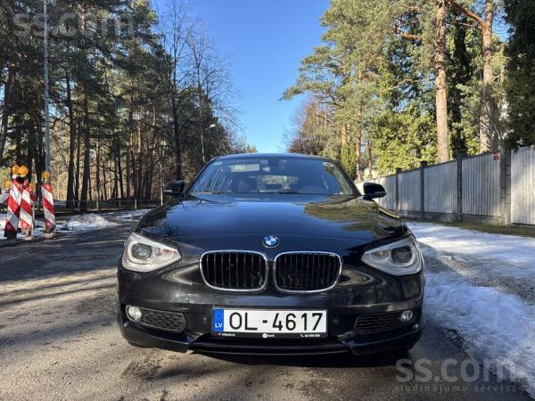 Black BMW 116 2014 in Riga, with an engine capacity of 1.60 L and mileage of 337 thousand km for 4990 €, photo 5 on AUTOMOTO.COM.LV
