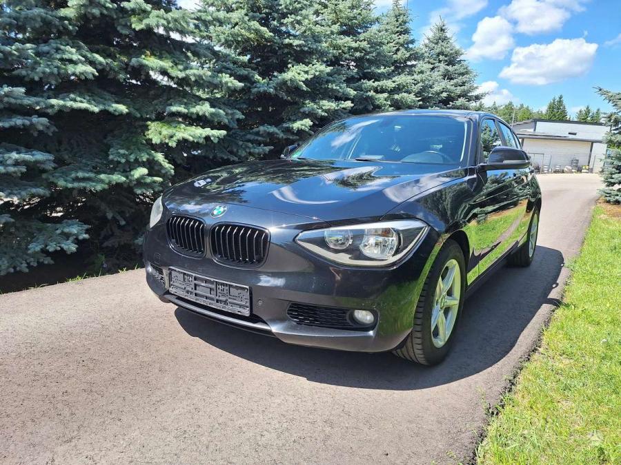 Black BMW 116 2014 in Utena, with an engine capacity of 2.00 L and mileage of 323 thousand km for 6200 €, photo 1 on AUTOMOTO.COM.LV