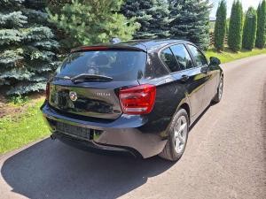 Black BMW 116 2014 in Utena, with an engine capacity of 2.00 L and mileage of 323 thousand km for 6200 €, photo 4 on AUTOMOTO.COM.LV