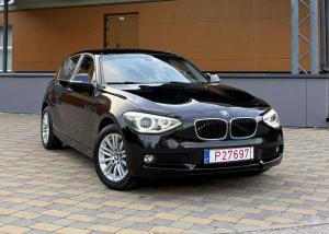 Black BMW 116 2014 in Druskininkai, with an engine capacity of 1.60 L and mileage of 140 thousand km for 6500 €, photo  on AUTOMOTO.COM.LV