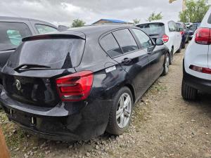 Black BMW 116 2014 in Kaunas, with an engine capacity of 1.60 L and mileage of 230 thousand km for 2800 €, photo 3 on AUTOMOTO.COM.LV