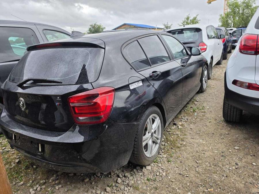 Black BMW 116 2014 in Kaunas, with an engine capacity of 1.60 L and mileage of 230 thousand km for 2800 €, photo 3 on AUTOMOTO.COM.LV