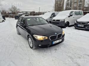 Black BMW 116 2015 in Riga, with an engine capacity of 1.50 L and mileage of 232 thousand km for 8990 €, photo 2 on AUTOMOTO.COM.LV