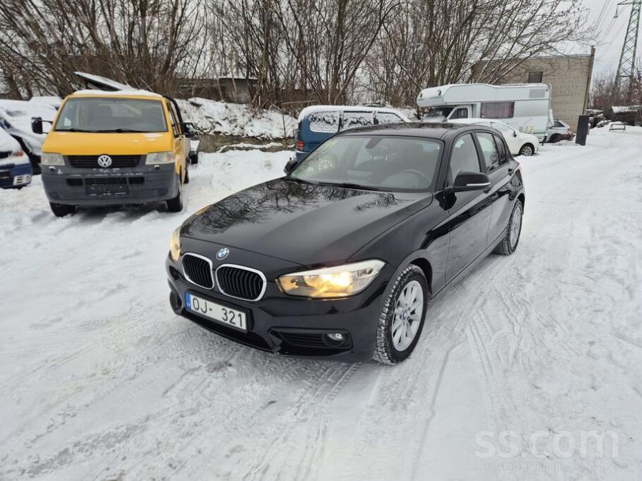 Black BMW 116 2015 in Riga, with an engine capacity of 1.50 L and mileage of 232 thousand km for 8990 €, photo 4 on AUTOMOTO.COM.LV