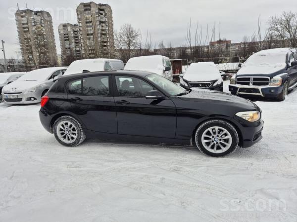 Black BMW 116 2015 in Riga, with an engine capacity of 1.50 L and mileage of 232 thousand km for 8990 €, photo 5 on AUTOMOTO.COM.LV