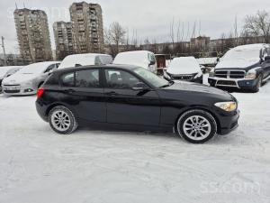 Black BMW 116 2015 in Riga, with an engine capacity of 1.50 L and mileage of 232 thousand km for 8990 €, photo 5 on AUTOMOTO.COM.LV