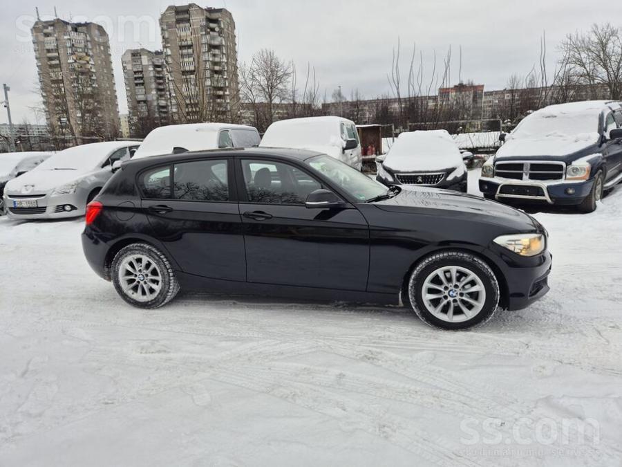 Black BMW 116 2015 in Riga, with an engine capacity of 1.50 L and mileage of 232 thousand km for 8990 €, photo 5 on AUTOMOTO.COM.LV