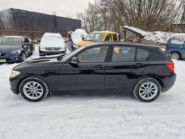 Black BMW 116 2015 in Riga, with an engine capacity of 1.50 L and mileage of 232 thousand km for 8990 €, photo 8 on AUTOMOTO.COM.LV