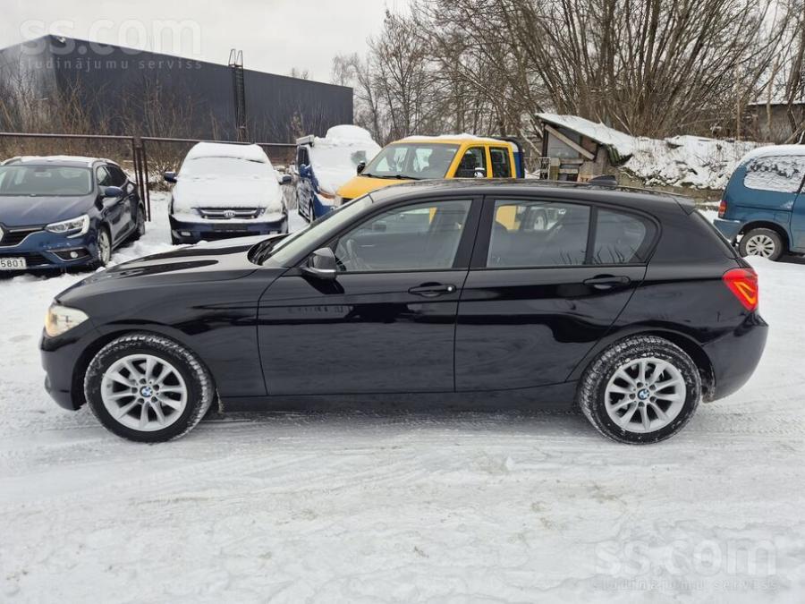 Black BMW 116 2015 in Riga, with an engine capacity of 1.50 L and mileage of 232 thousand km for 8990 €, photo 8 on AUTOMOTO.COM.LV