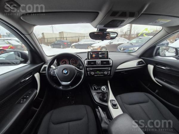 Black BMW 116 2015 in Riga, with an engine capacity of 1.50 L and mileage of 232 thousand km for 8990 €, photo 10 on AUTOMOTO.COM.LV