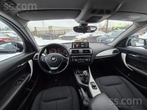 Black BMW 116 2015 in Riga, with an engine capacity of 1.50 L and mileage of 232 thousand km for 8990 €, photo 10 on AUTOMOTO.COM.LV