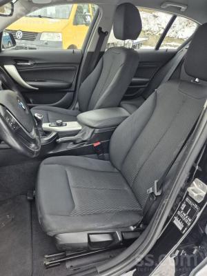 Black BMW 116 2015 in Riga, with an engine capacity of 1.50 L and mileage of 232 thousand km for 8990 €, photo 11 on AUTOMOTO.COM.LV