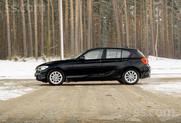 Black BMW 116 2015 in Riga, with an engine capacity of 1.50 L and mileage of 232 thousand km for 8990 €, photo 5 on AUTOMOTO.COM.LV