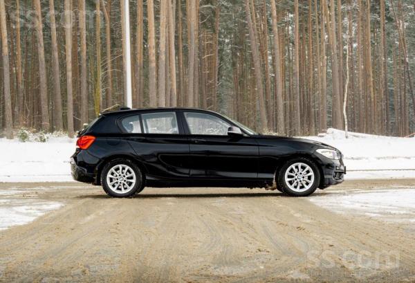 Black BMW 116 2015 in Riga, with an engine capacity of 1.50 L and mileage of 232 thousand km for 8990 €, photo 9 on AUTOMOTO.COM.LV