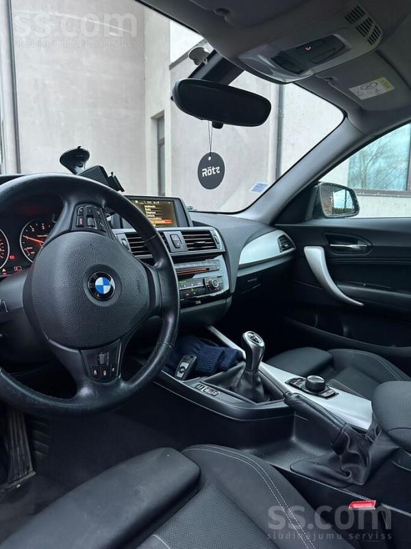 Melns BMW 116 2015 Rīga, ar dzinēja tilpumu 1.50 L un nobraukumu 129 tūkst. km par 7750 €, foto 7 vietnē AUTOMOTO.COM.LV