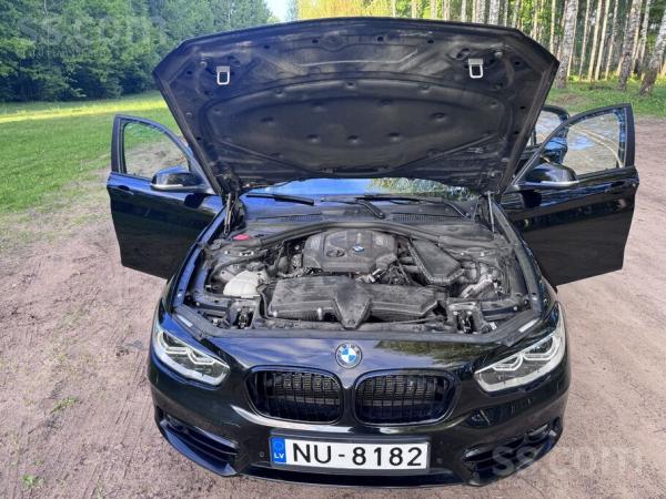 Black BMW 116 2015 in Riga, with an engine capacity of 1.60 L and mileage of 209 thousand km for 11550 €, photo 4 on AUTOMOTO.COM.LV