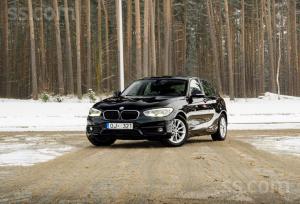 Black BMW 116 2015 in Riga, with an engine capacity of 1.50 L and mileage of 232 thousand km for 7290 €, photo  on AUTOMOTO.COM.LV