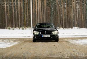 Black BMW 116 2015 in Riga, with an engine capacity of 1.50 L and mileage of 232 thousand km for 7290 €, photo 4 on AUTOMOTO.COM.LV