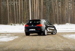 Black BMW 116 2015 in Riga, with an engine capacity of 1.50 L and mileage of 232 thousand km for 7290 €, photo 6 on AUTOMOTO.COM.LV