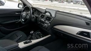 Black BMW 116 2015 in Riga, with an engine capacity of 1.50 L and mileage of 232 thousand km for 7290 €, photo 11 on AUTOMOTO.COM.LV