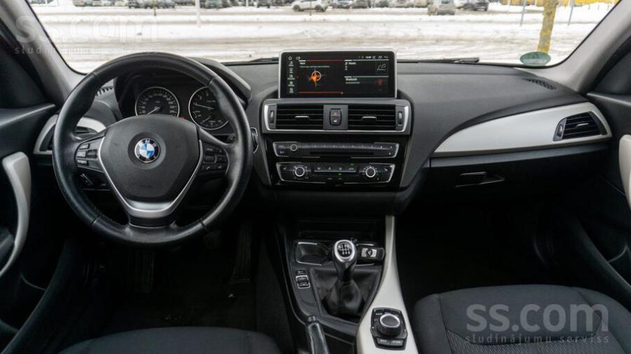 Black BMW 116 2015 in Riga, with an engine capacity of 1.50 L and mileage of 232 thousand km for 7290 €, photo 12 on AUTOMOTO.COM.LV