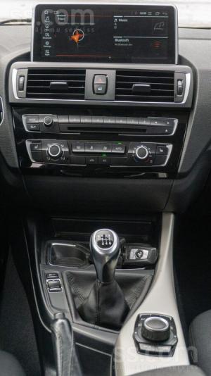 Black BMW 116 2015 in Riga, with an engine capacity of 1.50 L and mileage of 232 thousand km for 7290 €, photo 13 on AUTOMOTO.COM.LV