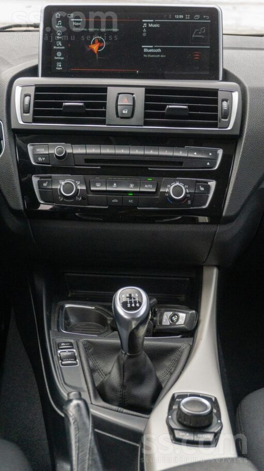 Black BMW 116 2015 in Riga, with an engine capacity of 1.50 L and mileage of 232 thousand km for 7290 €, photo 13 on AUTOMOTO.COM.LV