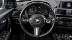 Black BMW 116 2015 in Riga, with an engine capacity of 1.50 L and mileage of 209 thousand km for 10990 €, photo 15 on AUTOMOTO.COM.LV