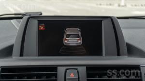 Black BMW 116 2015 in Riga, with an engine capacity of 1.50 L and mileage of 209 thousand km for 10990 €, photo 18 on AUTOMOTO.COM.LV