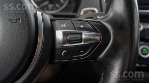 Black BMW 116 2015 in Riga, with an engine capacity of 1.50 L and mileage of 209 thousand km for 10990 €, photo 21 on AUTOMOTO.COM.LV