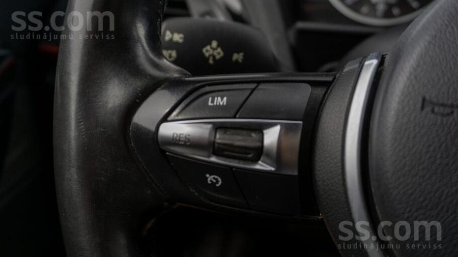 Black BMW 116 2015 in Riga, with an engine capacity of 1.50 L and mileage of 209 thousand km for 10990 €, photo 22 on AUTOMOTO.COM.LV