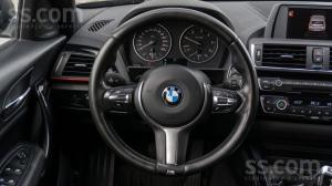 Black BMW 116 2015 in Riga, with an engine capacity of 1.50 L and mileage of 209 thousand km for 10990 €, photo 15 on AUTOMOTO.COM.LV