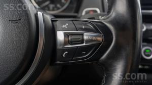 Black BMW 116 2015 in Riga, with an engine capacity of 1.50 L and mileage of 209 thousand km for 9590 €, photo 20 on AUTOMOTO.COM.LV