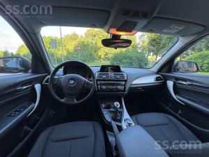 Black BMW 116 2016 in Bauska, with an engine capacity of 1.50 L and mileage of 237 thousand km for 6950 €, photo 16 on AUTOMOTO.COM.LV