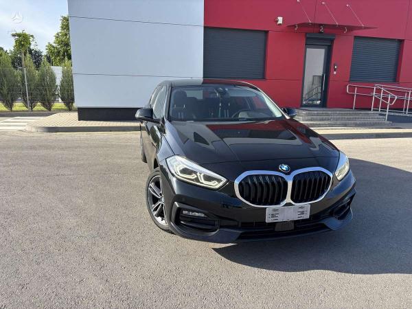 Black BMW 116 2020 in Panevezys, with an engine capacity of 1.50 L and mileage of 130 thousand km for 13400 €, photo 1 on AUTOMOTO.COM.LV