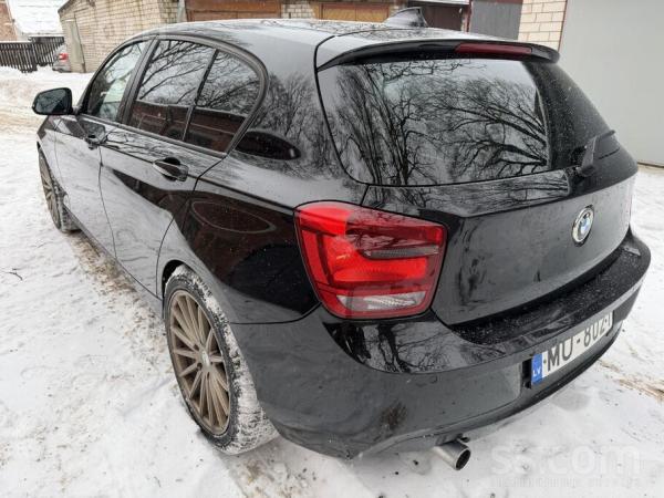 Black BMW 116 2011 in Liepaja, with an engine capacity of 2.00 L and mileage of 249 thousand km for 5300 €, photo 3 on AUTOMOTO.COM.LV