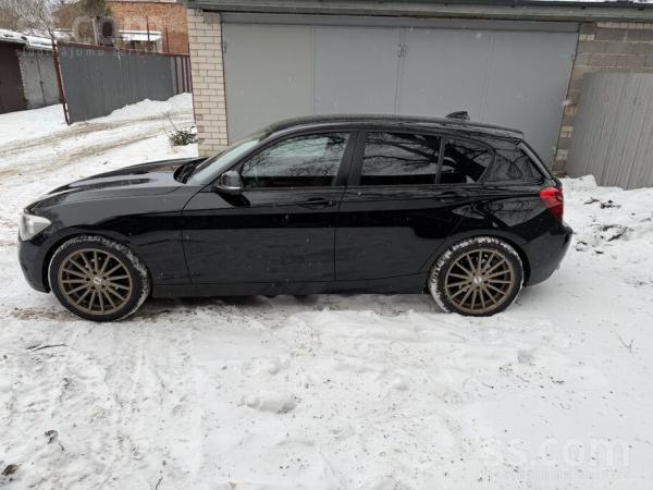 Black BMW 116 2011 in Liepaja, with an engine capacity of 2.00 L and mileage of 249 thousand km for 5300 €, photo 5 on AUTOMOTO.COM.LV