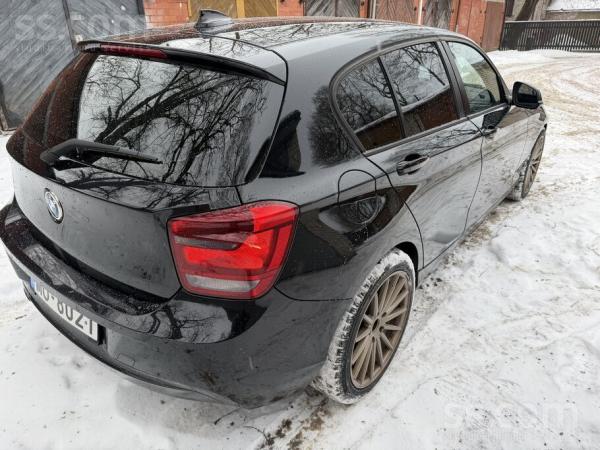 Black BMW 116 2011 in Liepaja, with an engine capacity of 2.00 L and mileage of 249 thousand km for 5300 €, photo 8 on AUTOMOTO.COM.LV